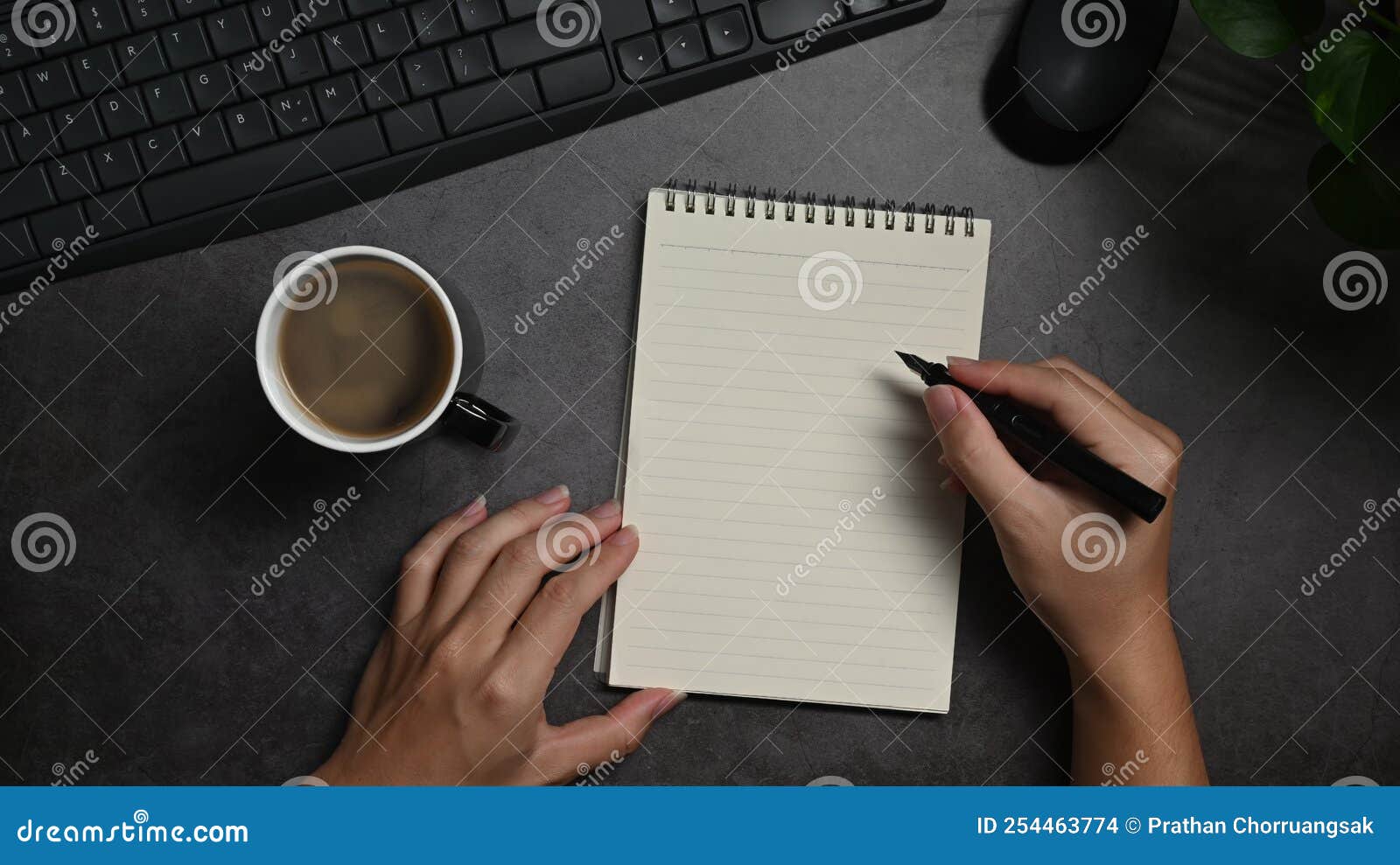 Overhead View of Man Hand Holding Pen and Writing on Blank Notebook ...
