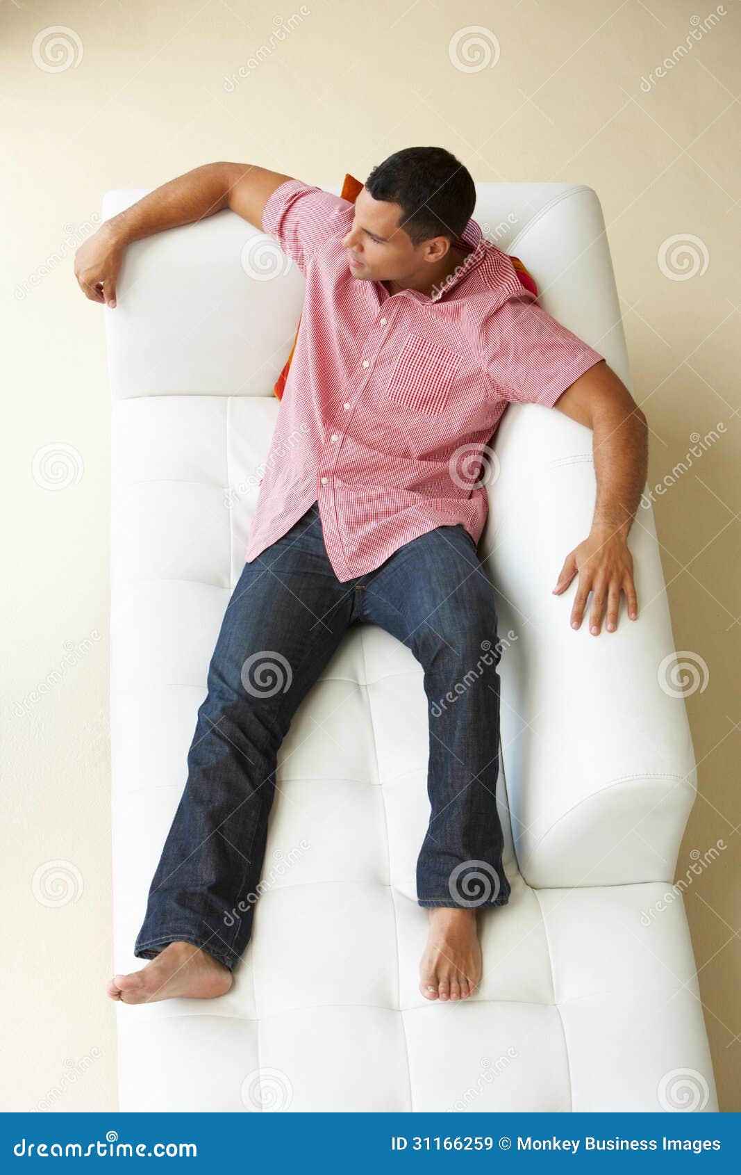Overhead View of Man Relaxing on Sofa Stock Image - Image of lounge ...