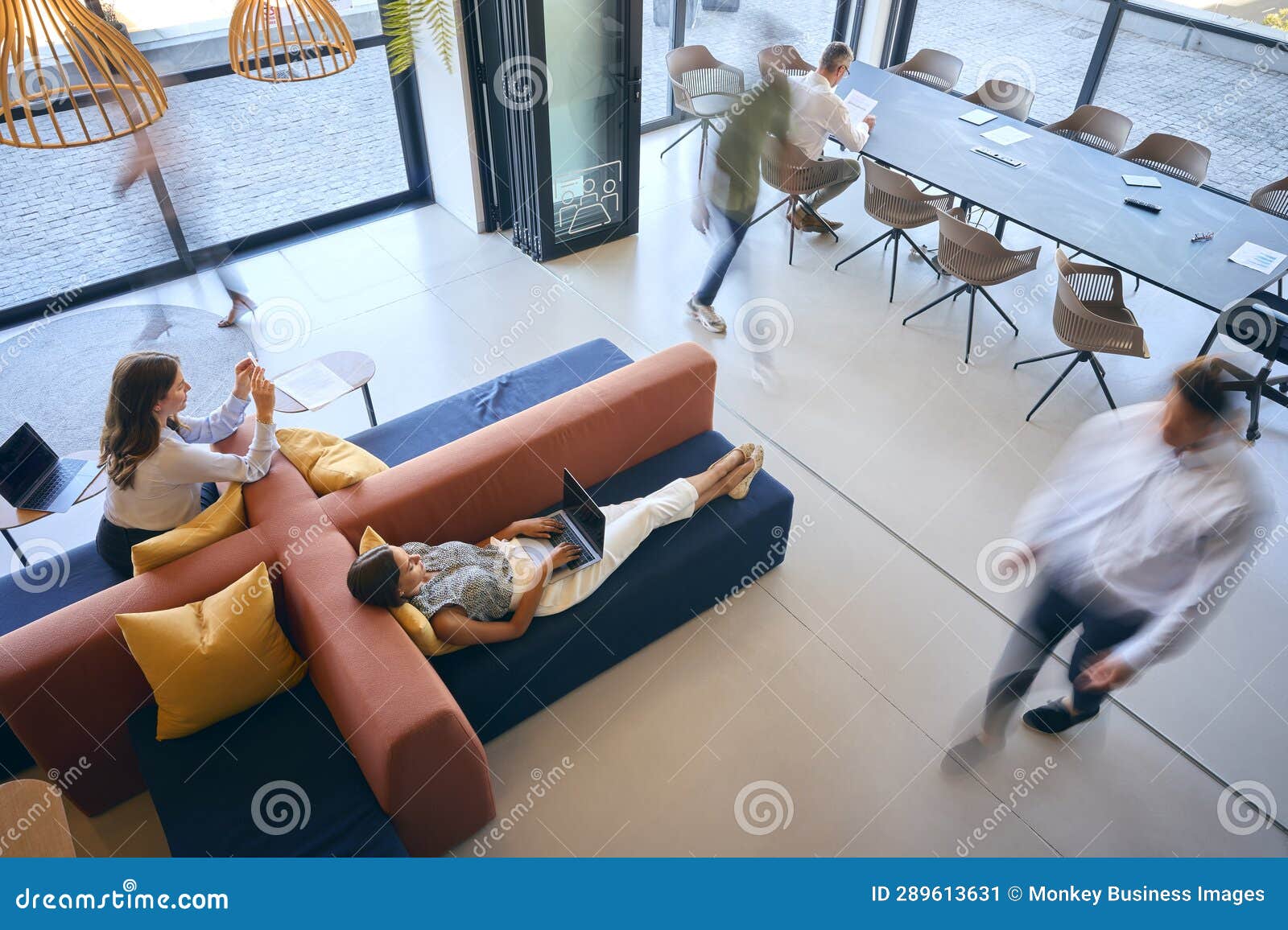 Overhead View of Modern Open Plan Office with Staff Working Around ...
