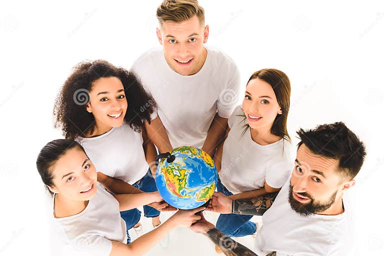Overhead View of Multicultural Group Holding Globe and Smiling while ...