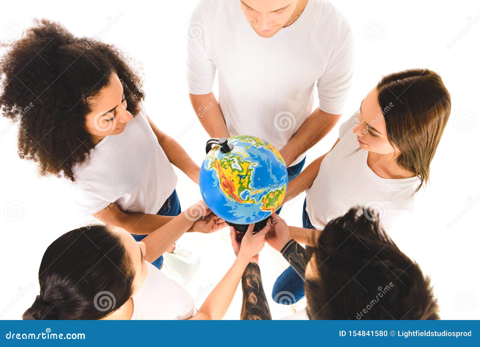 Overhead View of Multicultural Group Holding Globe and Standing in ...