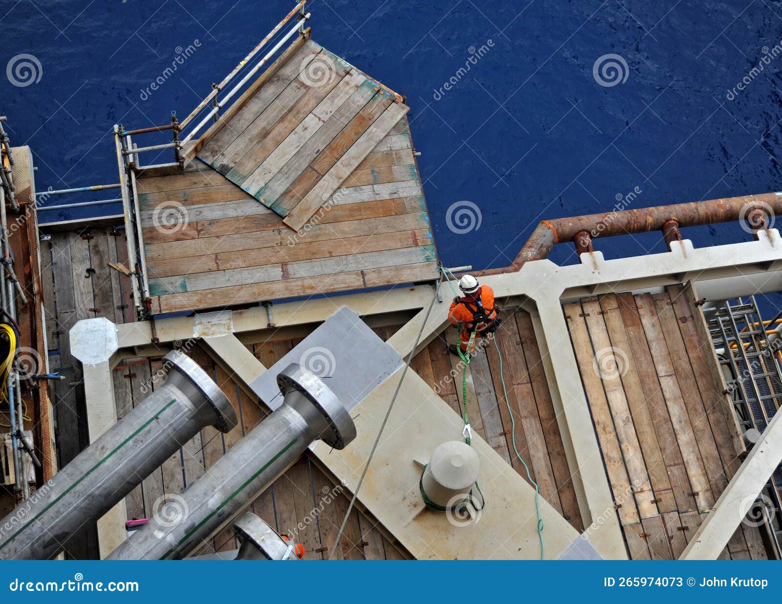 Overhead View of an Offshore Rigger Preparing a Platform To Accomodate ...