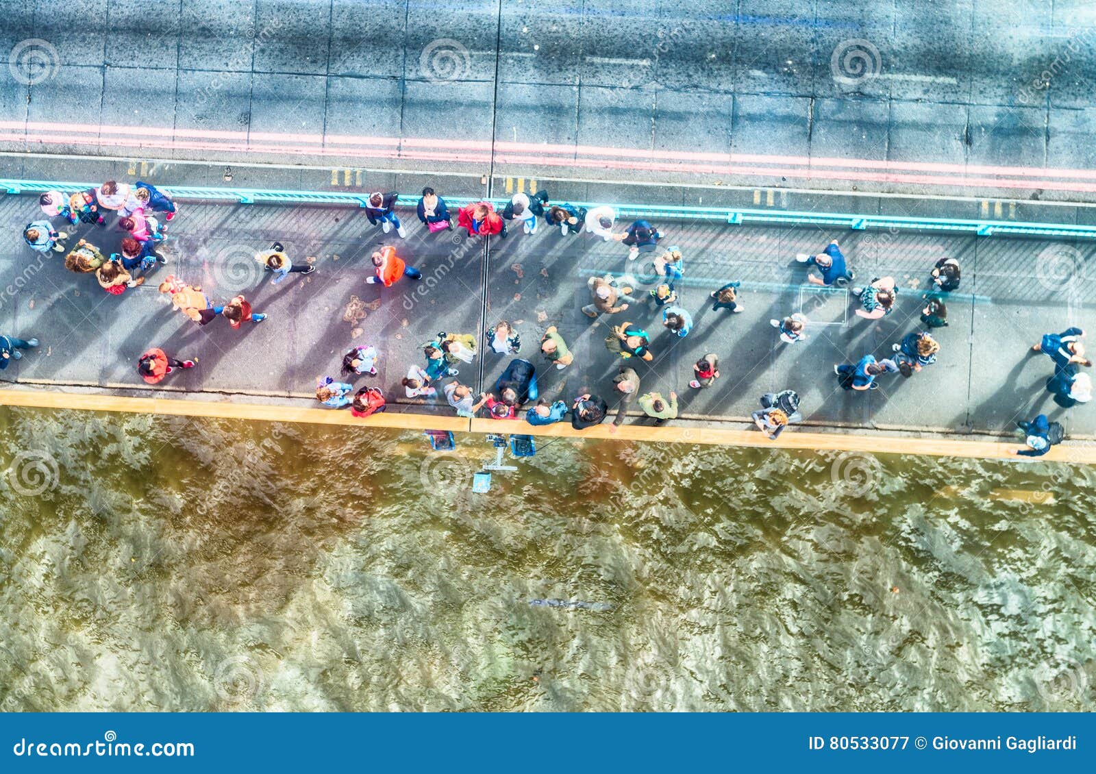 Overhead View of People Walking Over a Bridge Stock Image - Image of ...