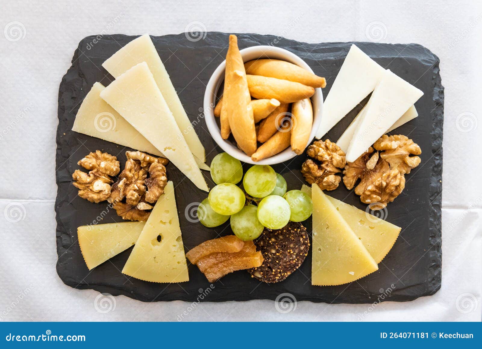 Overhead View on Platter of Cheese, Cracker, Nuts and Grapes Served on ...