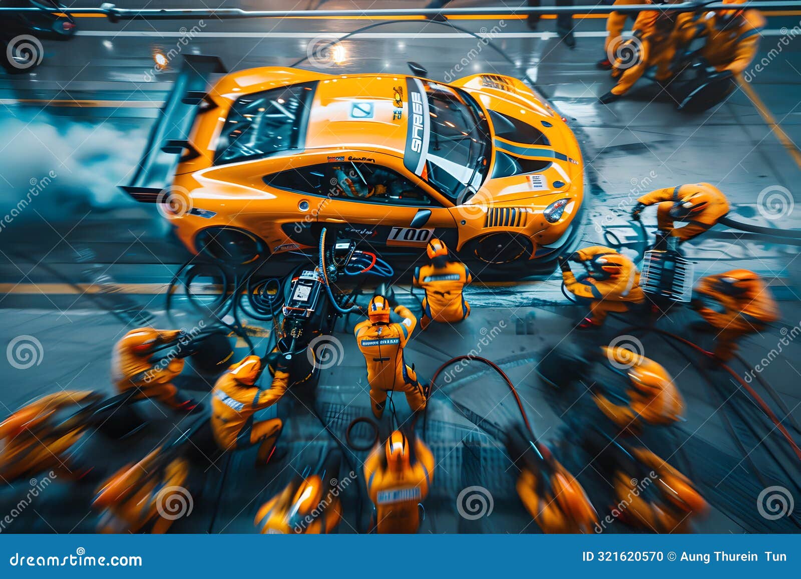 Overhead View of a Professional Pit Crew in a High Speed Race Stock ...