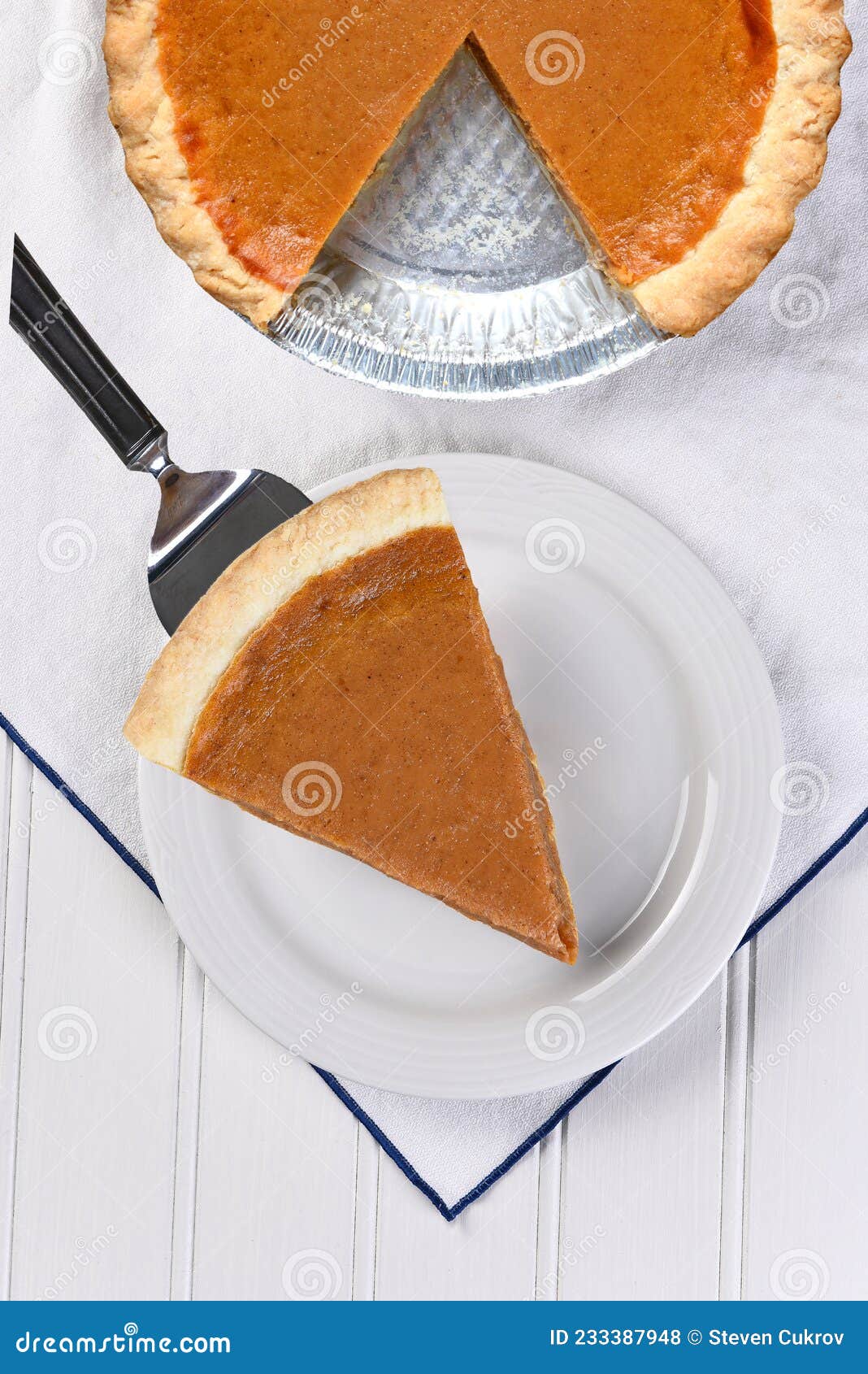 Overhead View of a Slice of Pumpkin Pie on a Serving Spatula the Rest ...