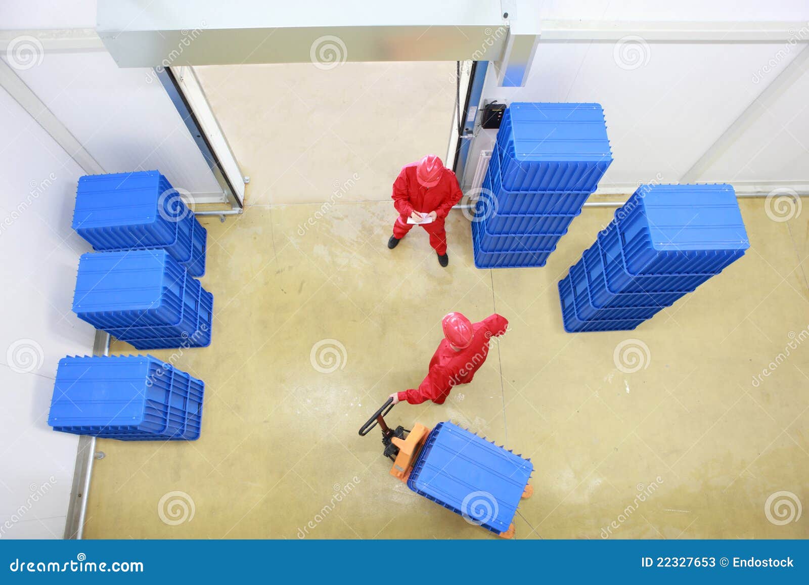 Overhead View of Two Workers in Small Warehouse Stock Image - Image of ...