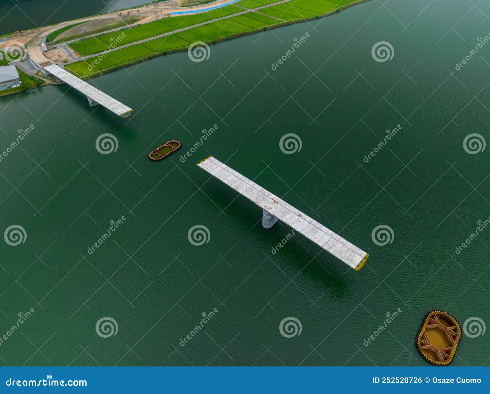 Overhead View of Unfinished Bridge and Pylon Foundations in River Stock ...