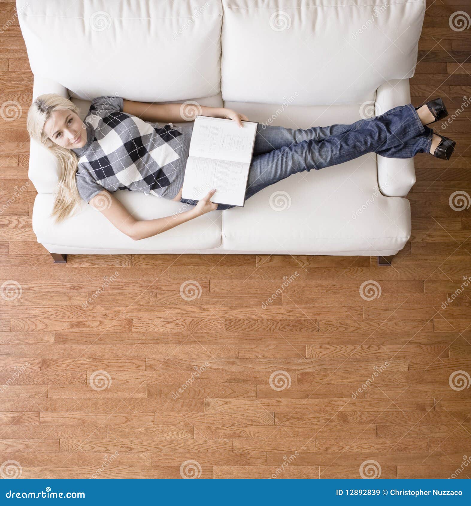 Overhead View of Woman with Book on Couch Stock Image - Image of blue ...