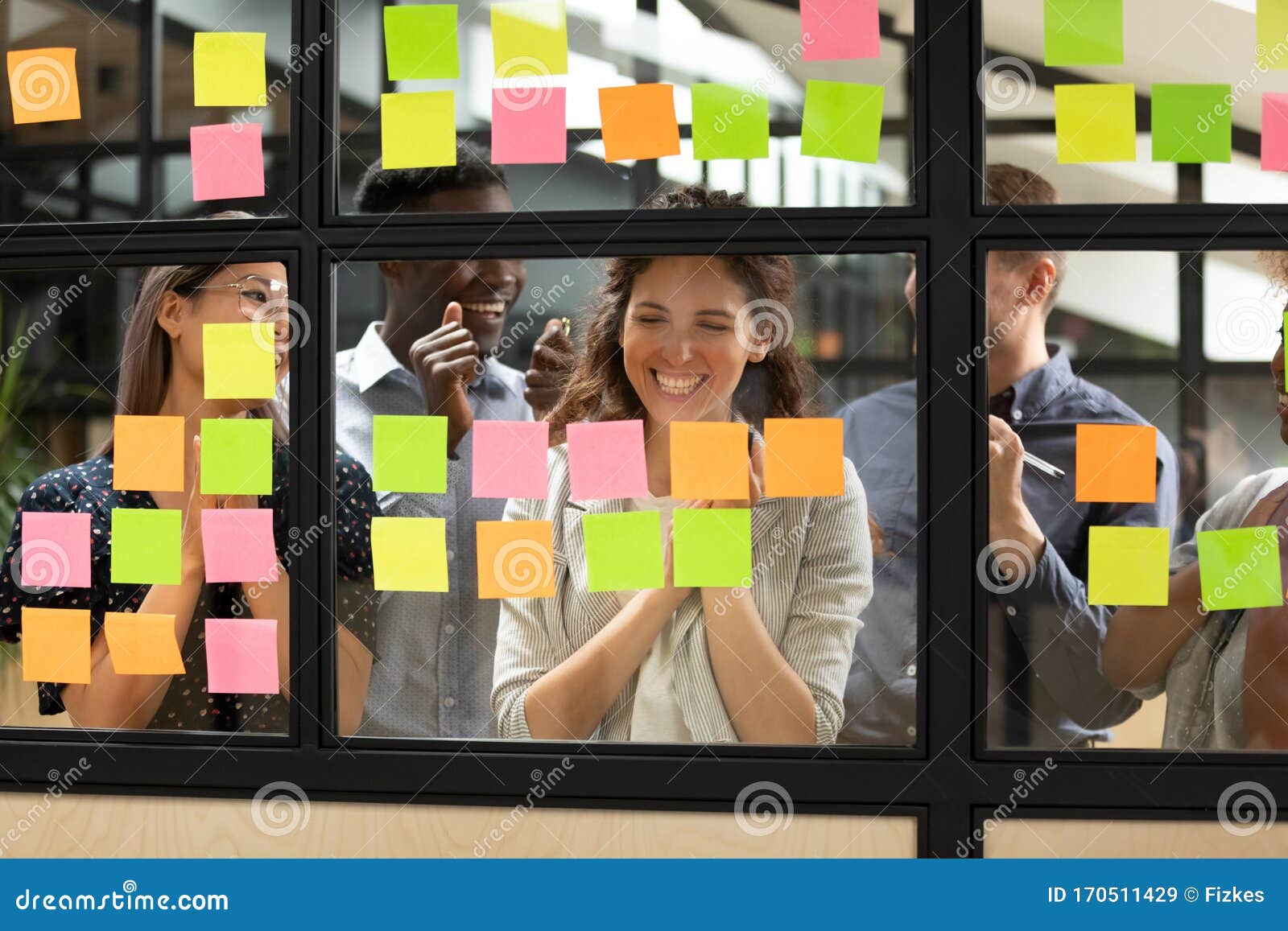 Overjoyed Diverse Colleagues Complete Group Creative Task Stock Image ...