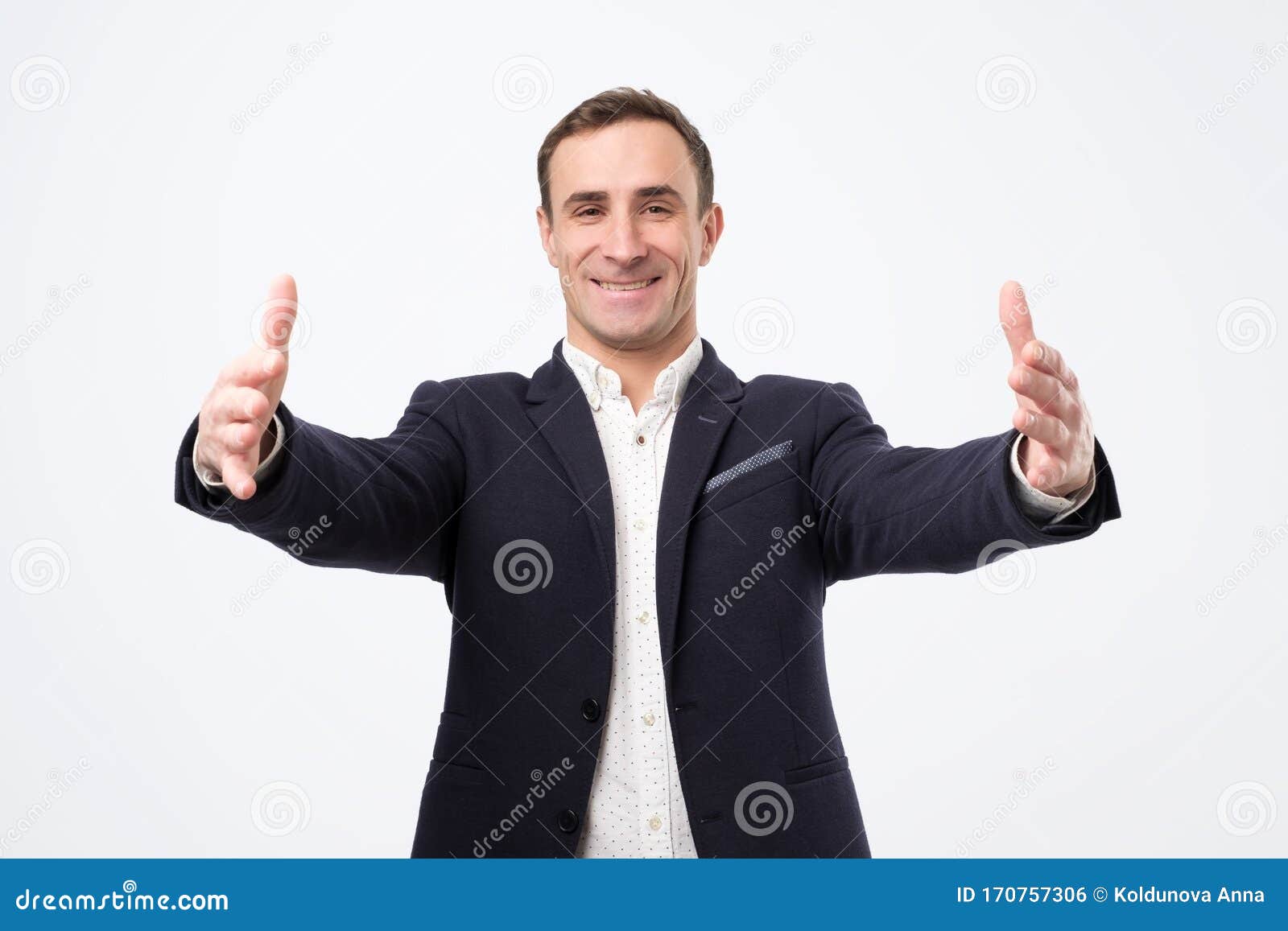 Overjoyed Happy Man in Suit Standing with His Hands Wide Open Welcoming ... Overjoyed Happy Man in Suit Standing with His Hands Wide Open Welcoming ...