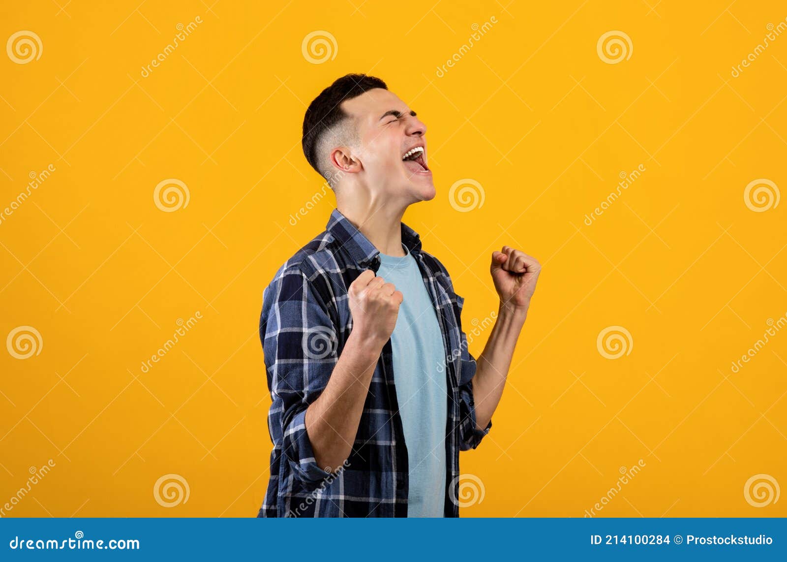 Overjoyed Millennial Guy Making YES Gesture with Both Hands, Feeling ...