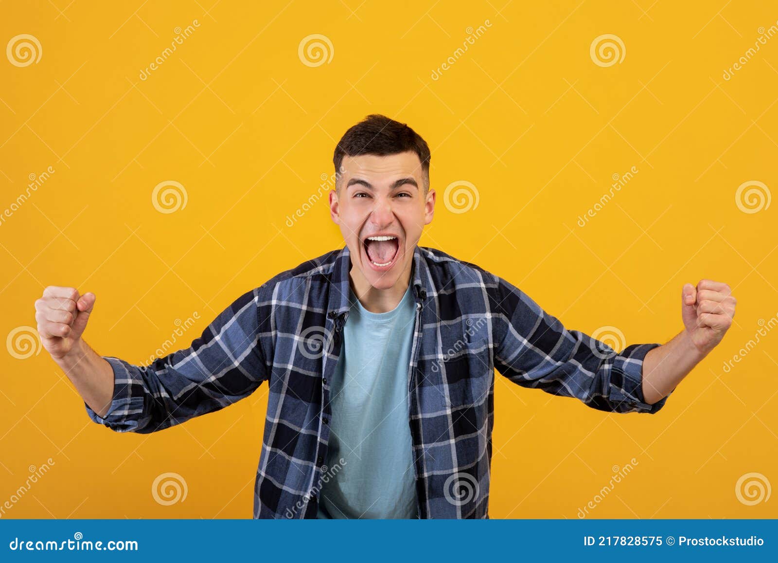 Overjoyed Millennial Guy Screaming in Excitement, Gesturing YES with ...