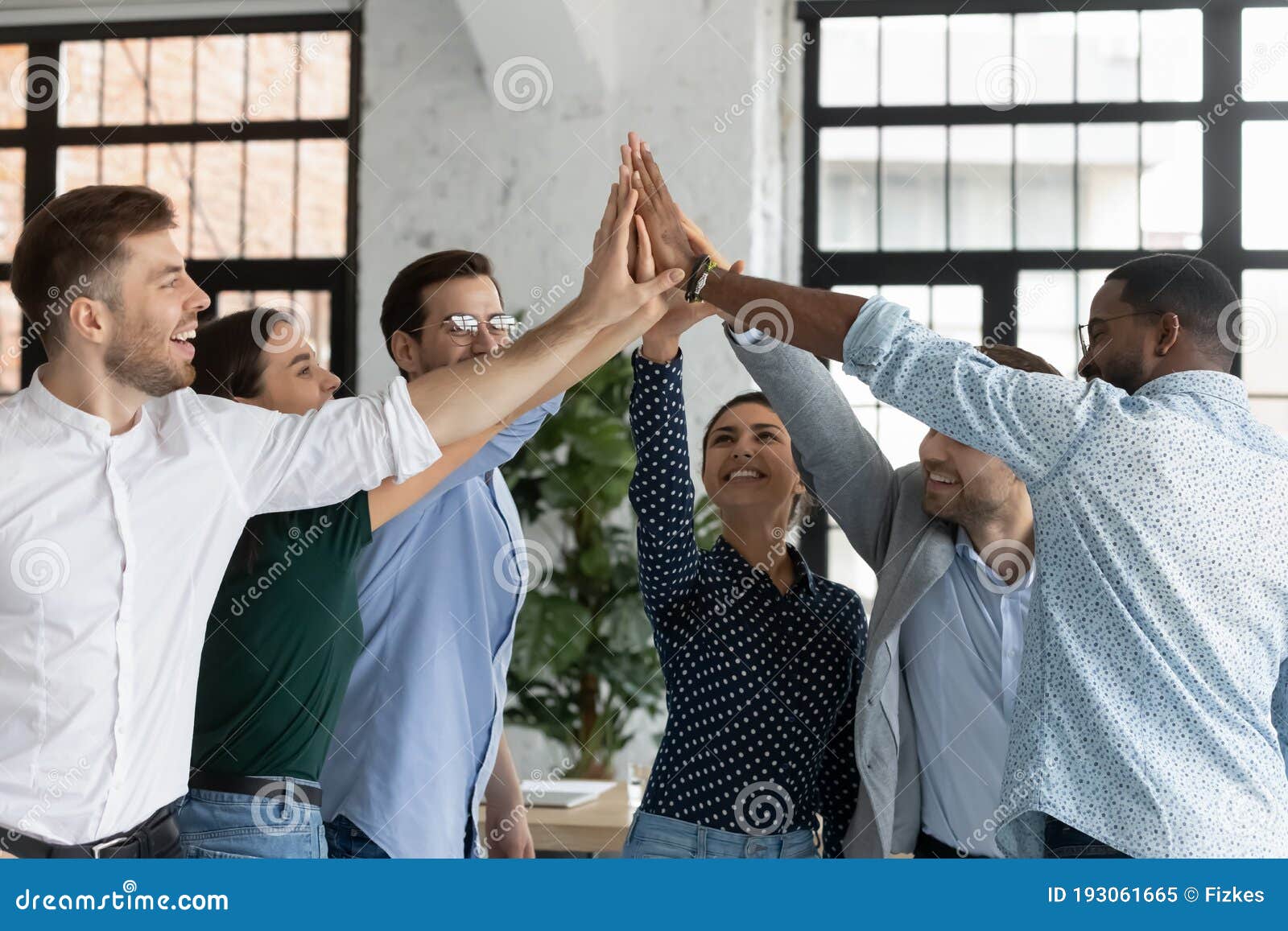Overjoyed Successful Diverse Employees Giving High Five at Meeting ... Overjoyed Successful Diverse Employees Giving High Five at Meeting ...
