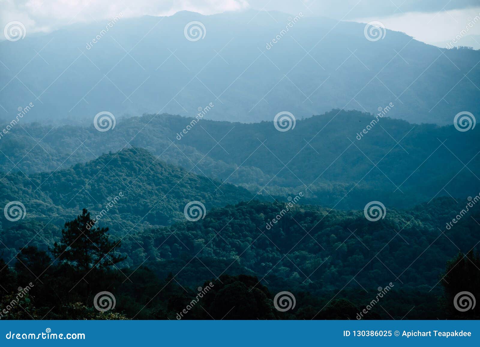 Overlapping mountains stock image. Image of overlapping - 130386025