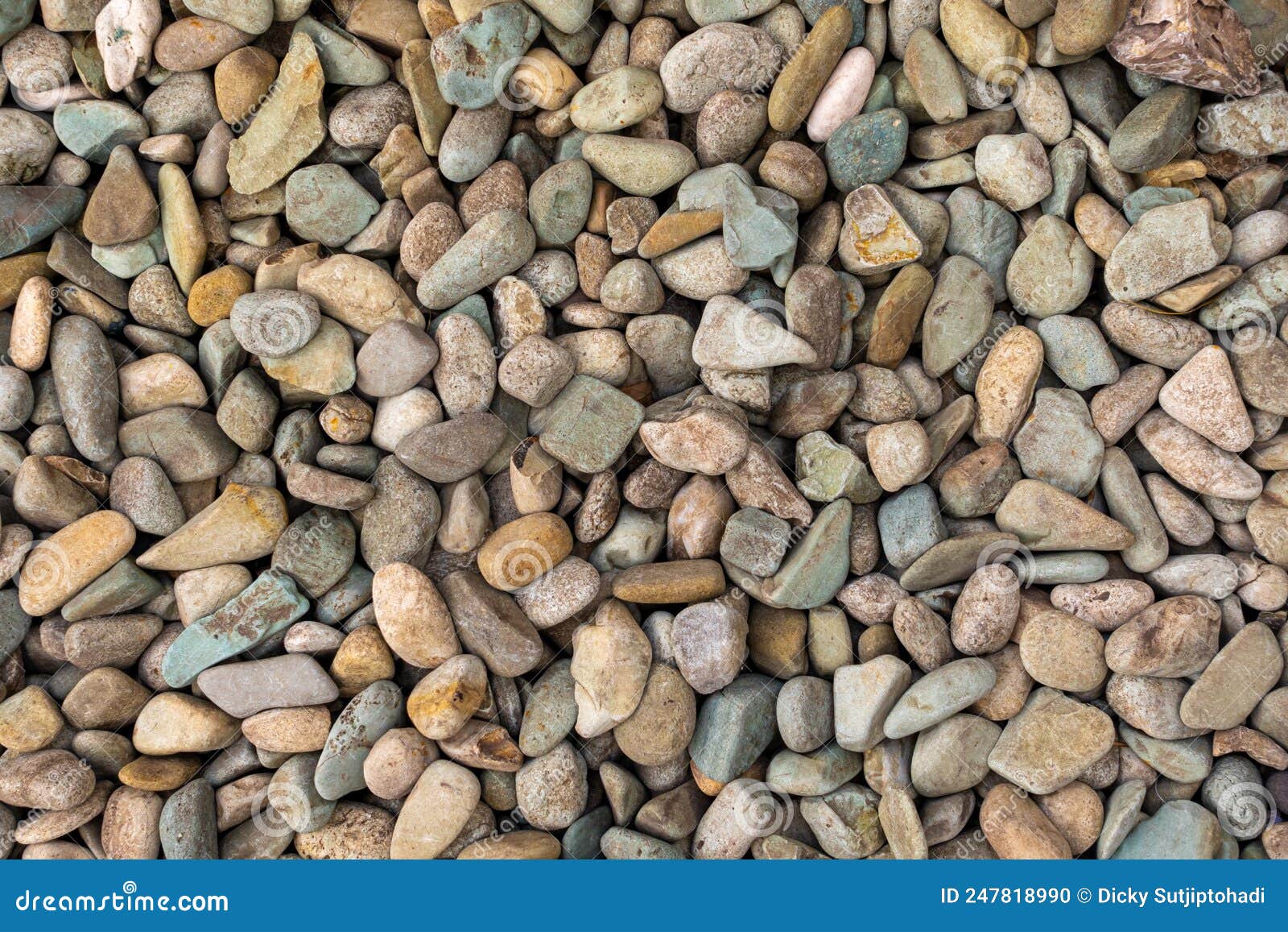 An Overlay of Various Pastel-colored and Multi-shaped Small Pebbles ...