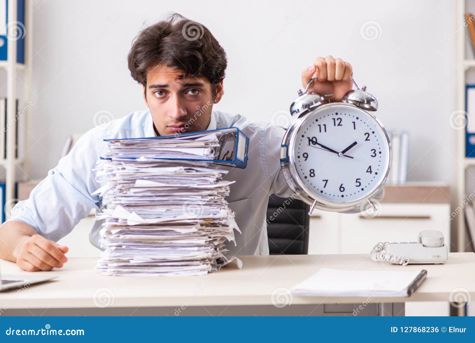 The Overloaded Busy Employee with Too Much Work and Paperwork Stock ...