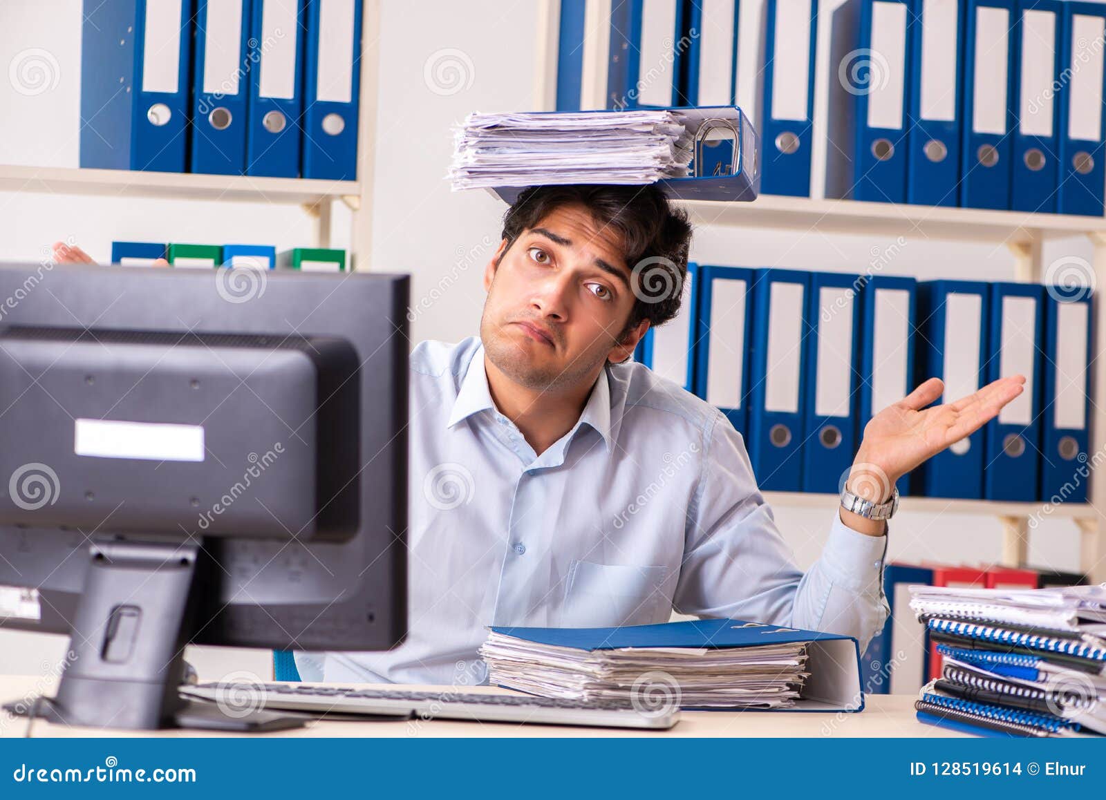 The Overloaded Busy Employee with Too Much Work and Paperwork Stock ...
