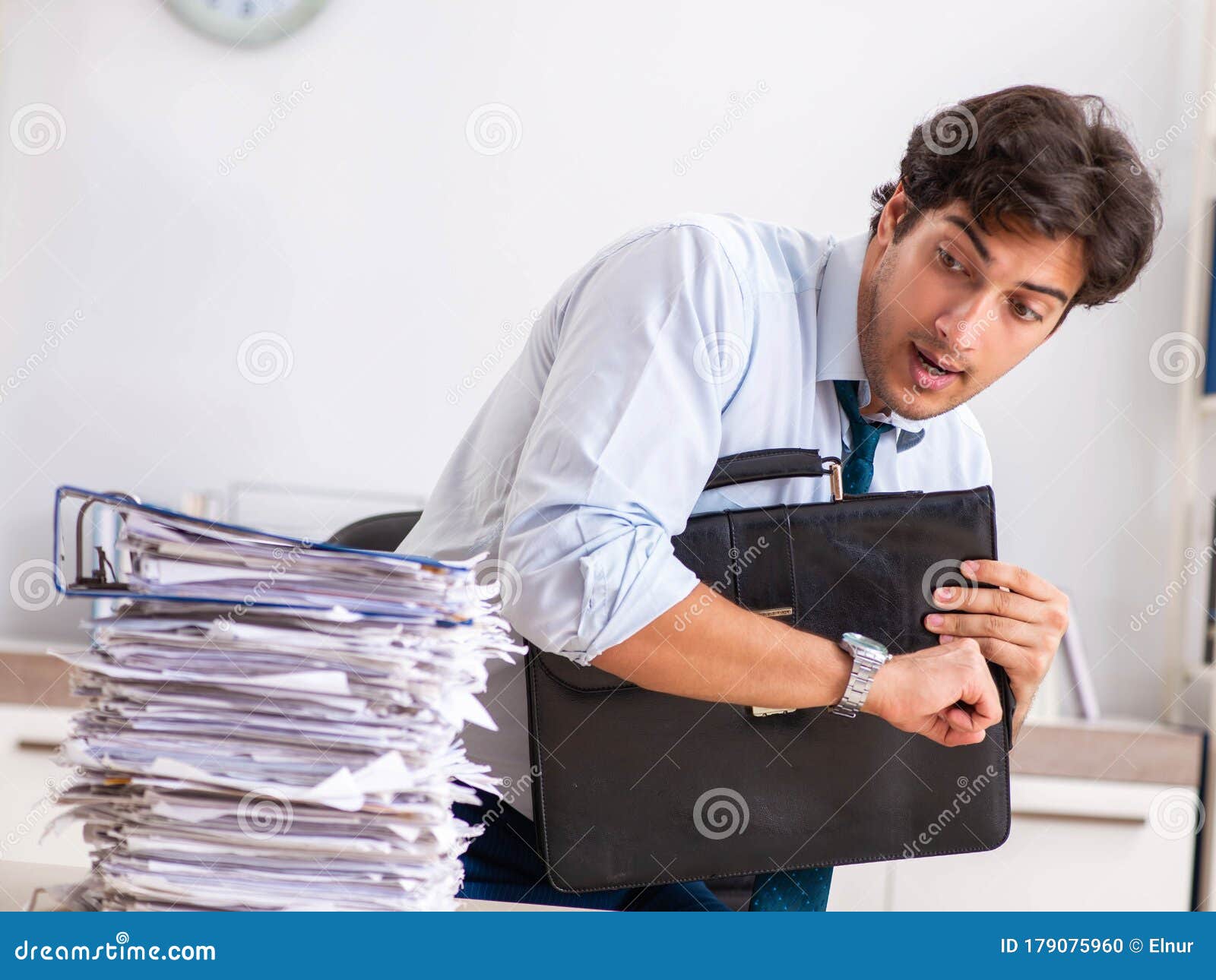 Overloaded Busy Employee with Too Much Work and Paperwork Stock Photo ...