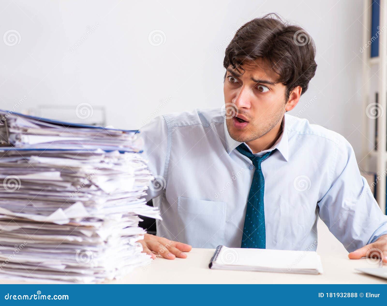 Overloaded Busy Employee with Too Much Work and Paperwork Stock Photo ...
