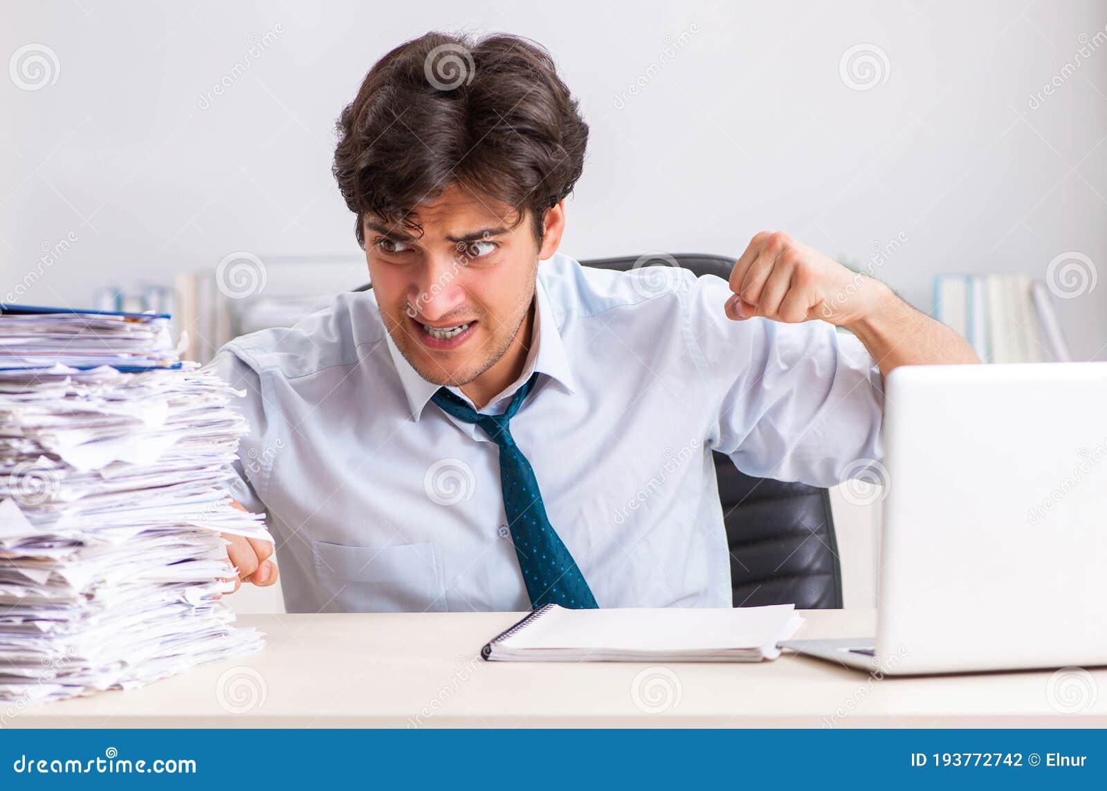 Overloaded Busy Employee with Too Much Work and Paperwork Stock Photo ...