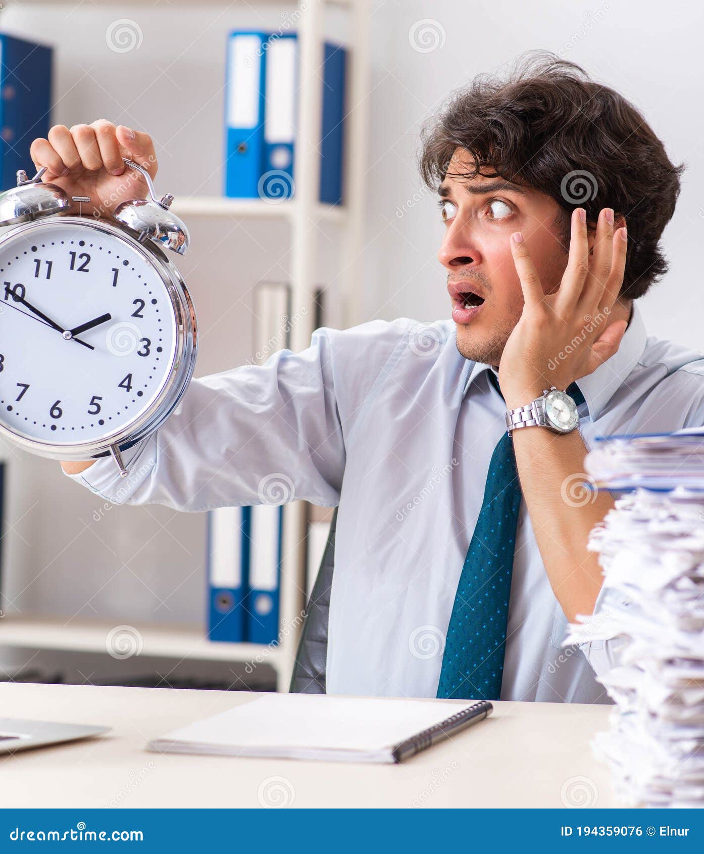 Overloaded Busy Employee with Too Much Work and Paperwork Stock Photo ...