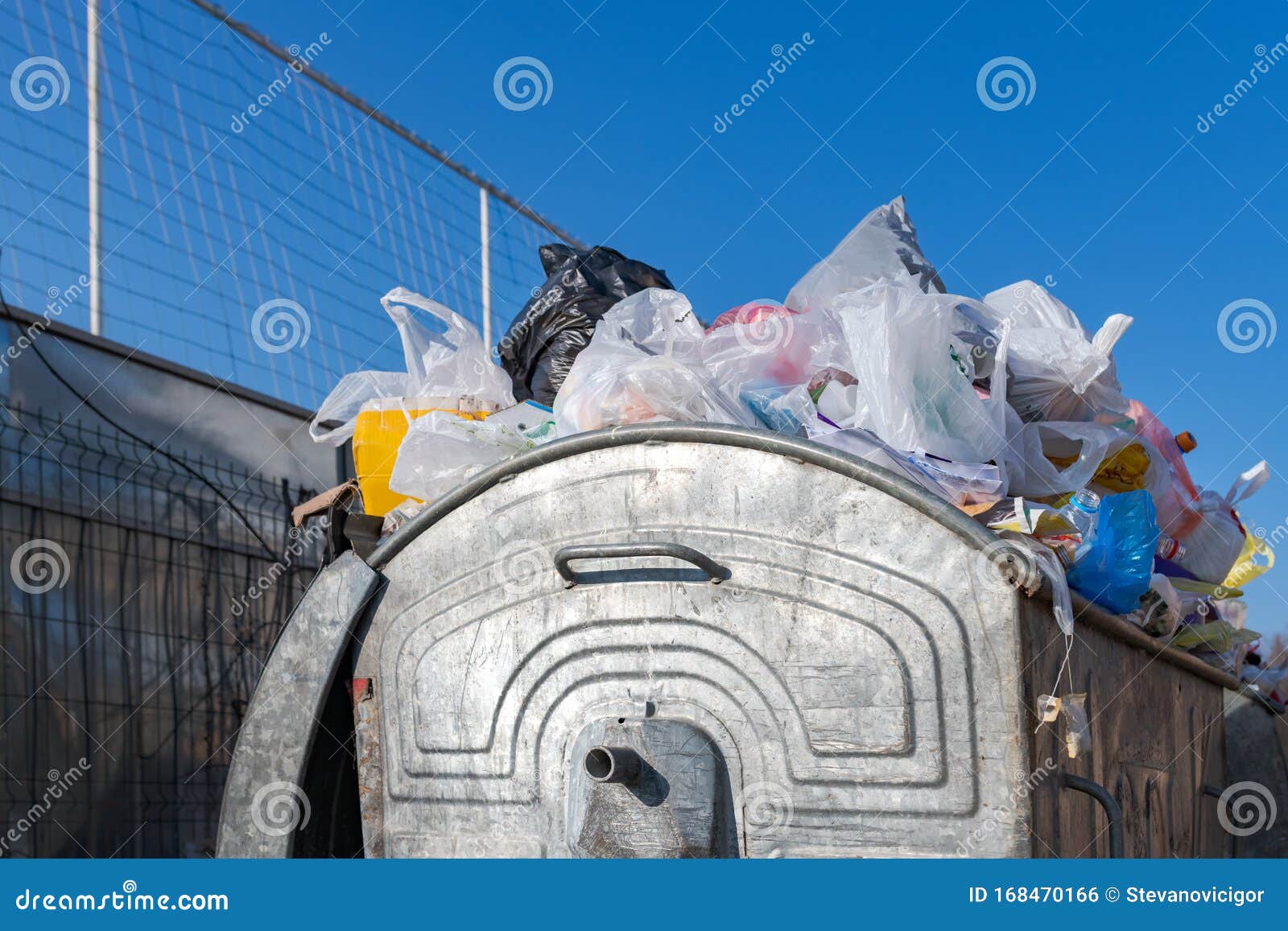 Overloaded Garbage Container Stock Photo - Image of container, litter ...