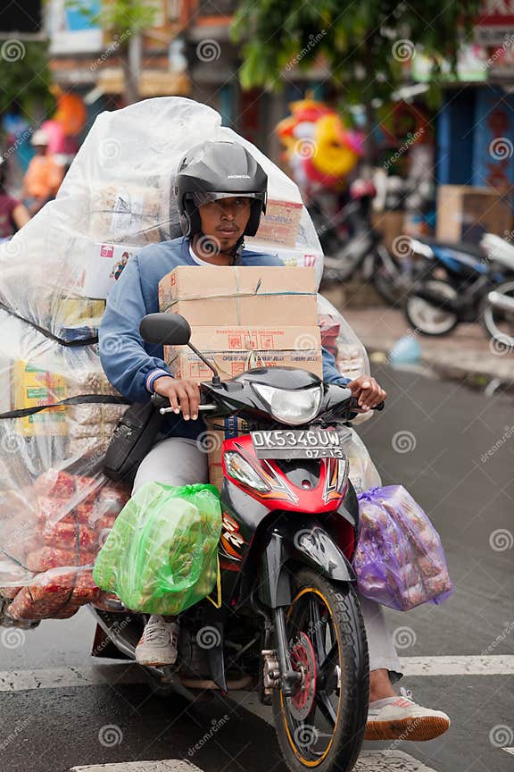 Overloaded motorcycle editorial photo. Image of driving - 23608576