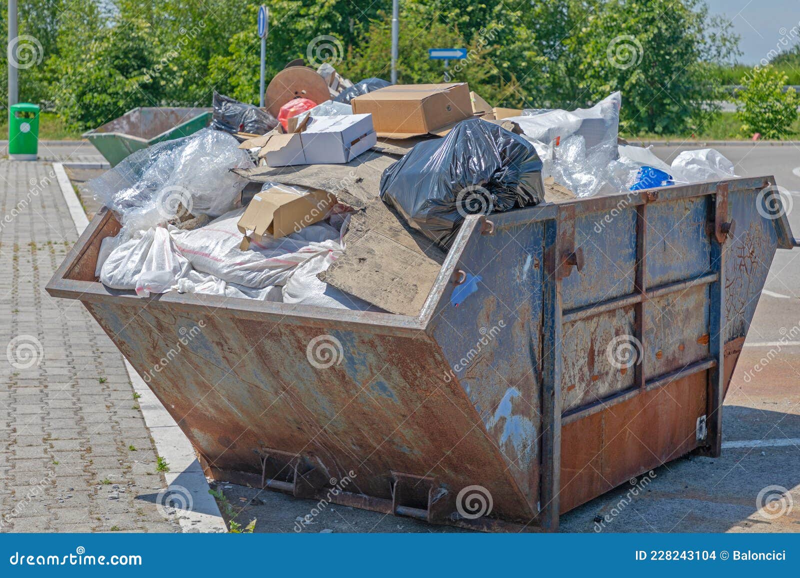 Overloaded Skip Container stock photo. Image of metal - 228243104