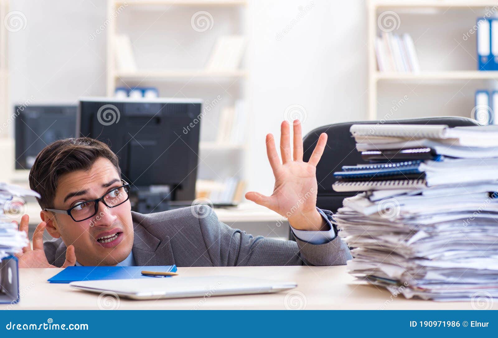 Overloaded with Work Employee Under Paperwork Burden Stock Photo ...