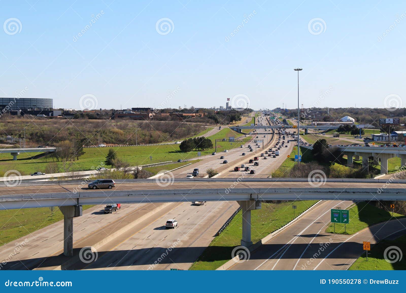 Overlooking an on and Off Ramp Interstate Highway Exchange with ...