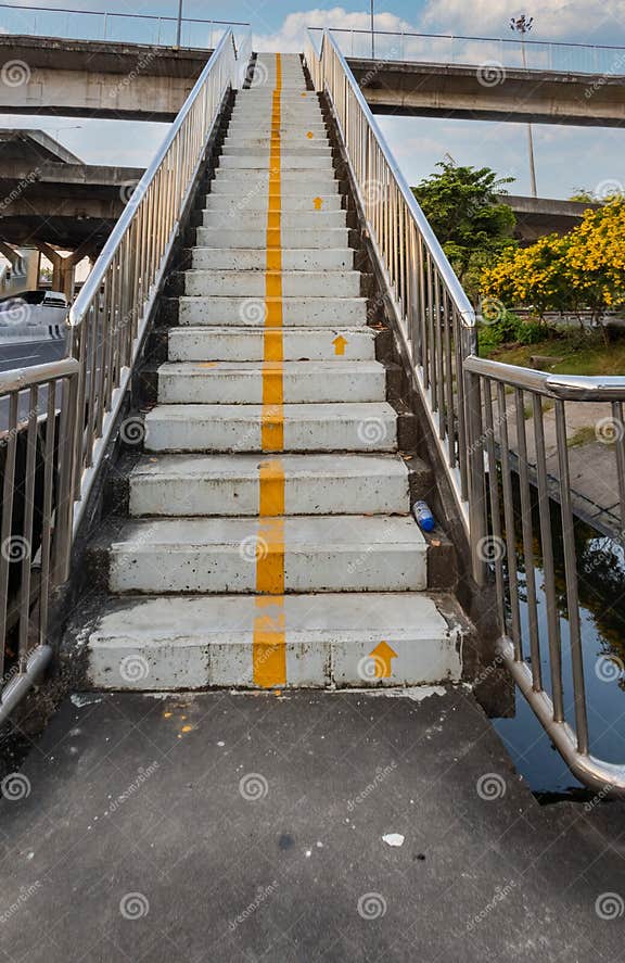Overpass Bridge with a Walking Direction Symbol on the Step Stock Image ...