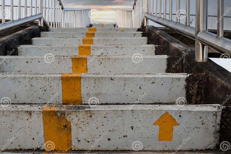 Overpass Bridge with a Walking Direction Symbol on the Step Stock Photo ...