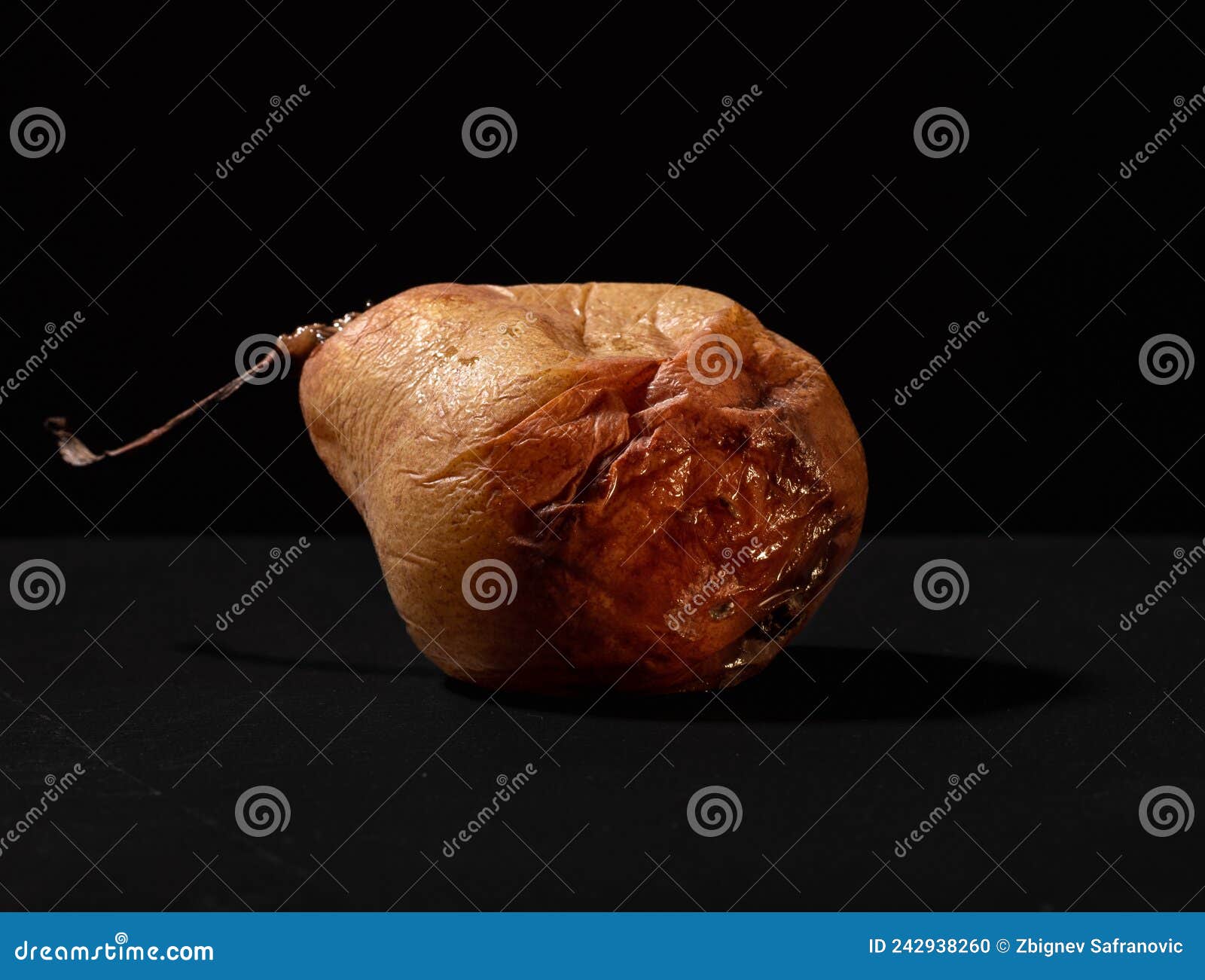 Overripe Pear with Black Background and Warm Lighting. Stock Photo ...