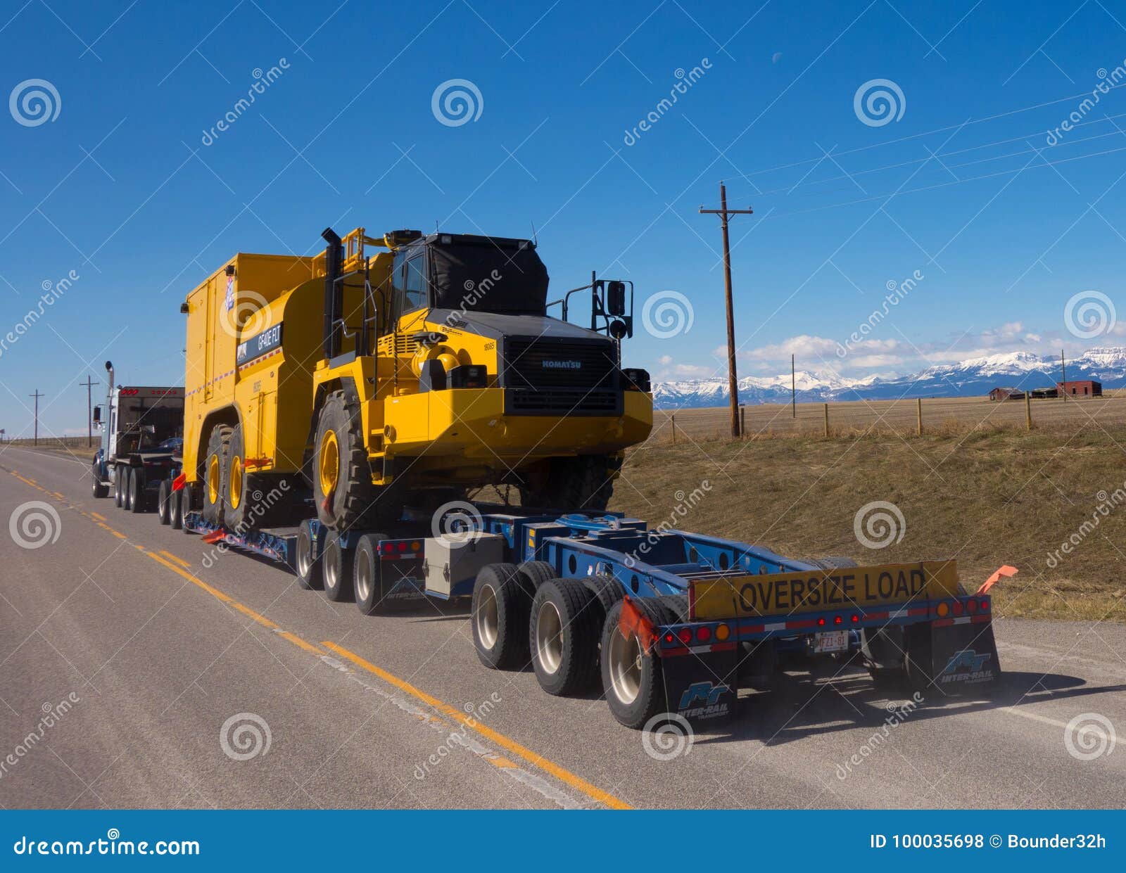 Oversized Equipment Being Pulled on a Trailer Editorial Stock Photo ...
