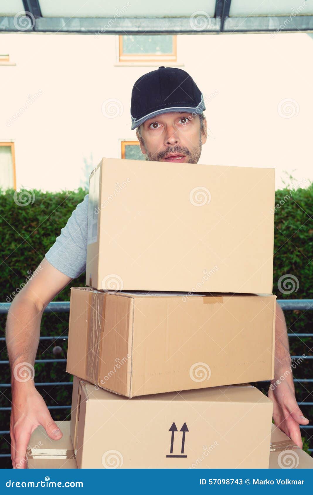 Overstrained Postman with Parcels Stock Image - Image of delivering ...