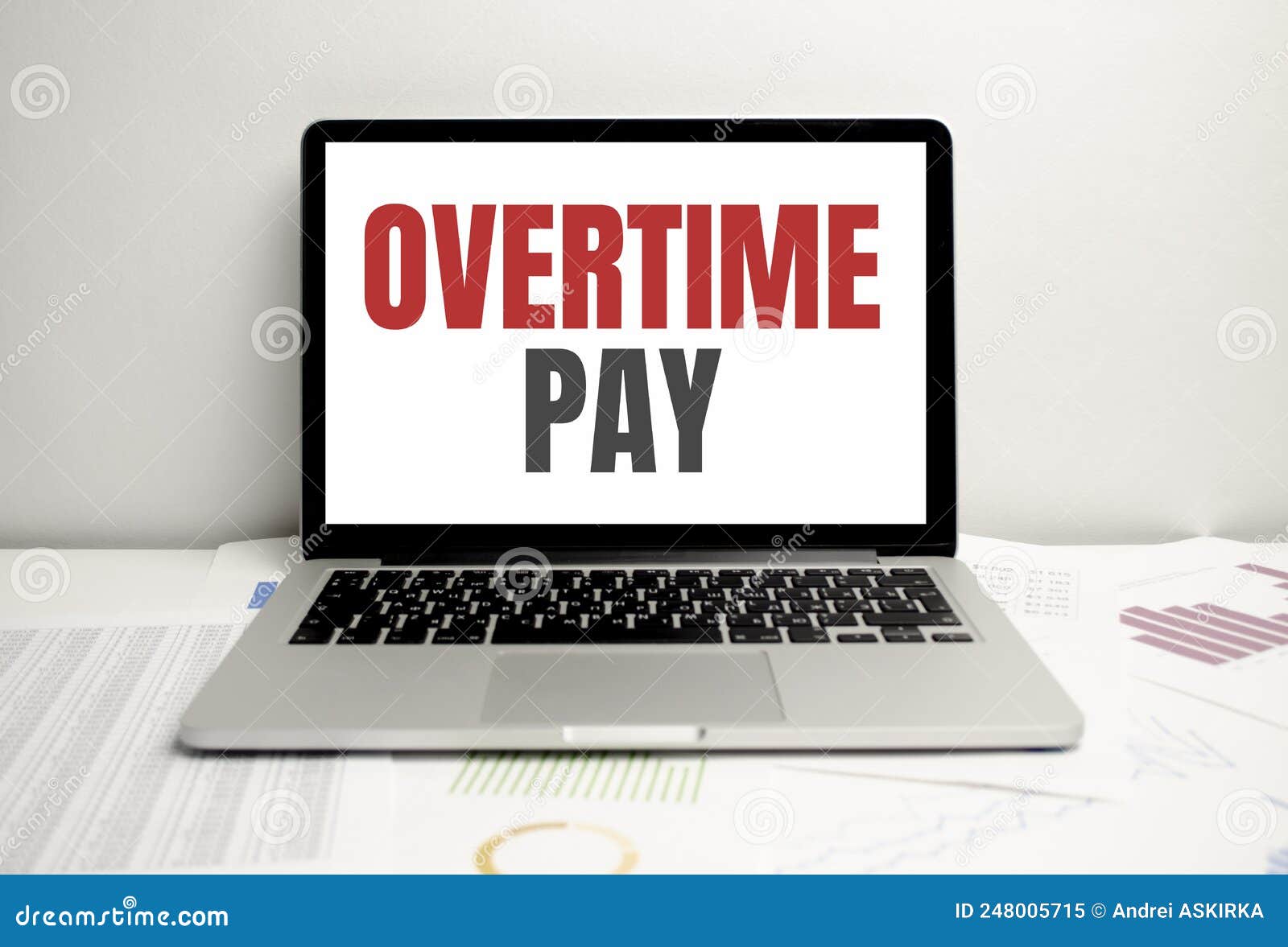 Overtime Pay Words on Laptop Display and Charts Stock Image - Image of ...