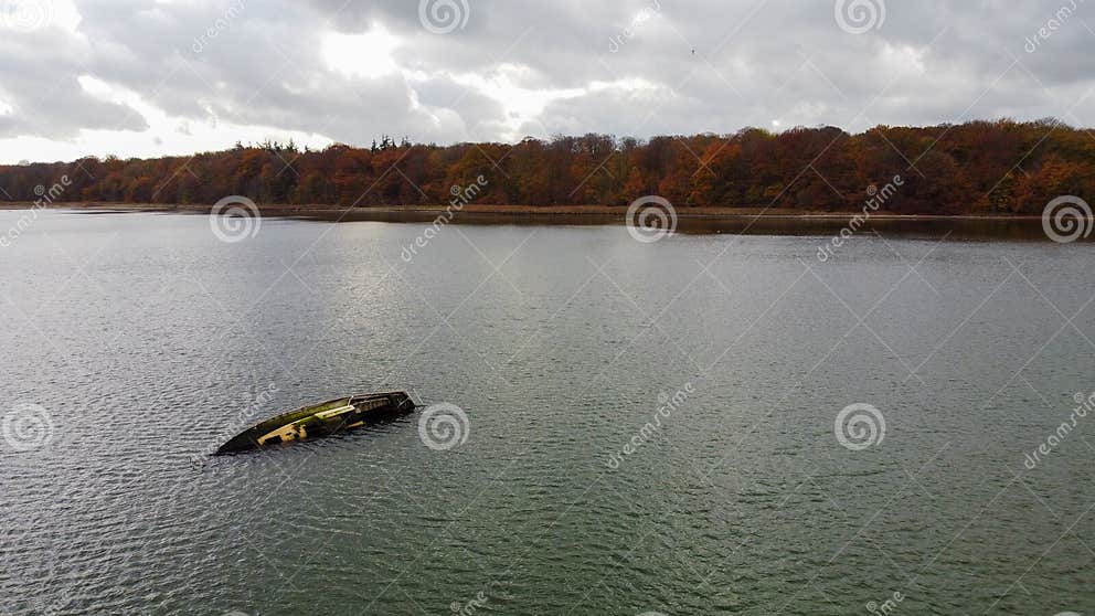 Overturned Boat in the Water Stock Photo - Image of stream, calm: 237881558