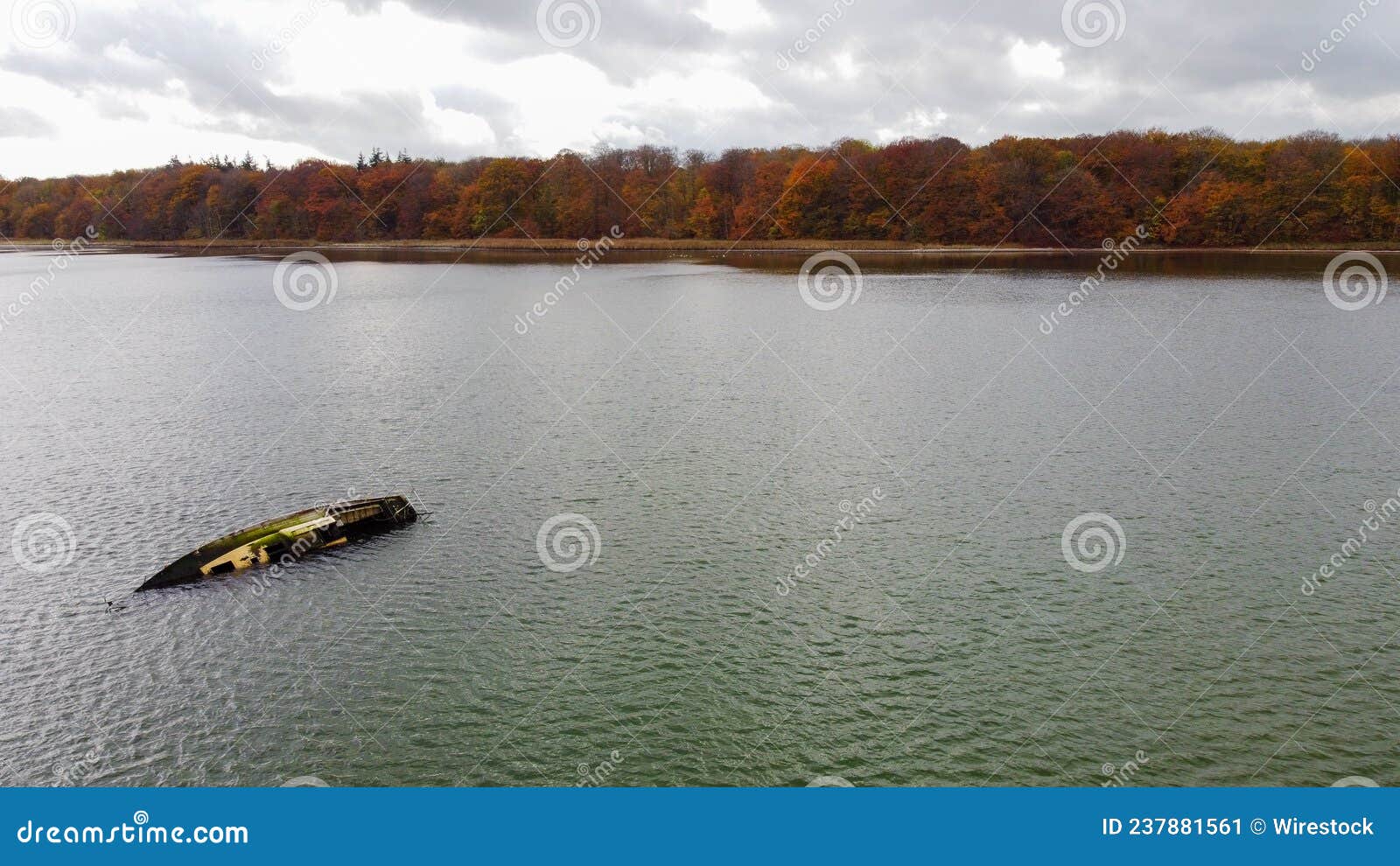 Overturned Boat in the Water Stock Image - Image of outdoors, shore ...