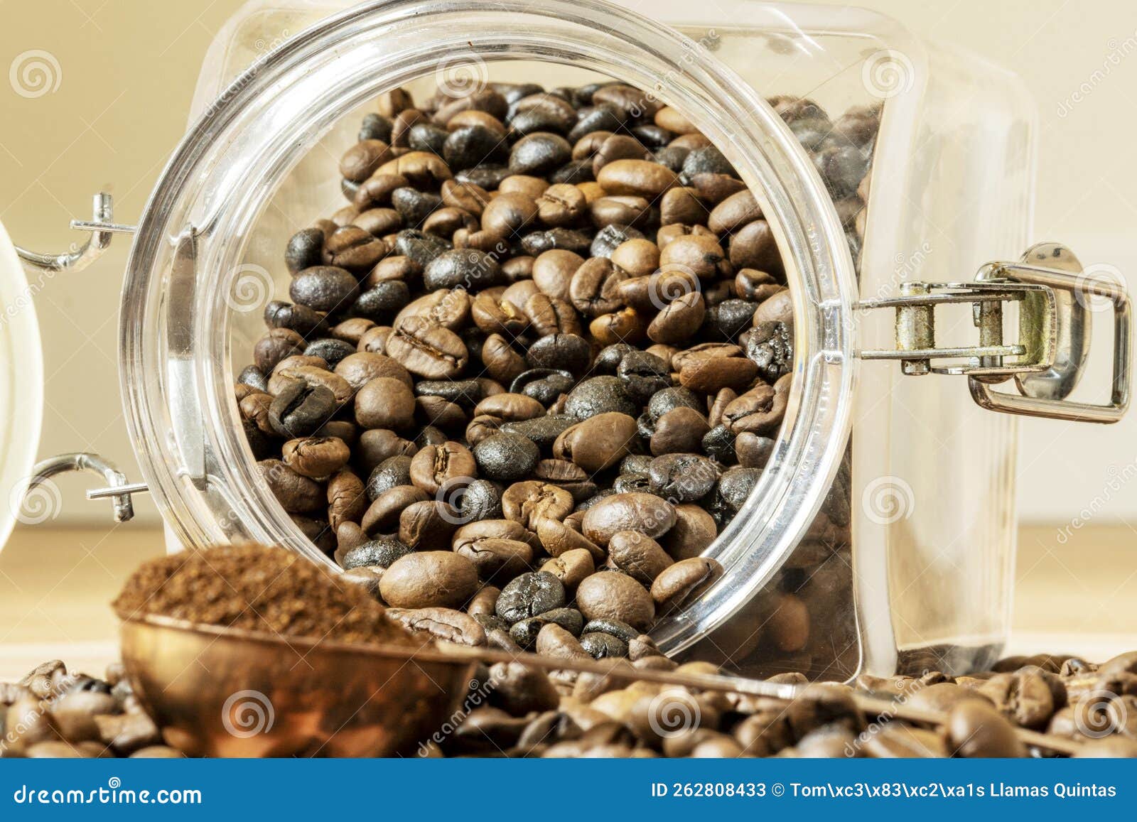 Overturned Coffee Beans from a Tin and a Copper Meter with Ground ...