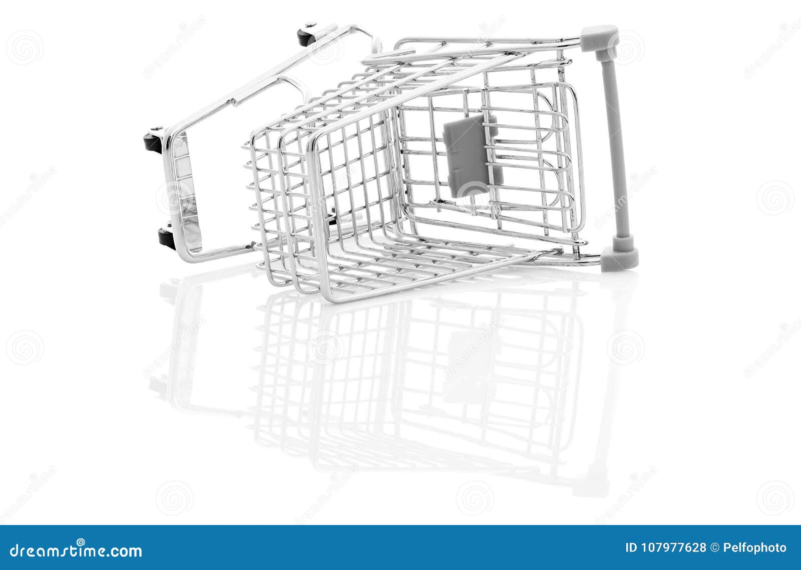 Overturned shopping cart stock photo. Image of cash - 107977628