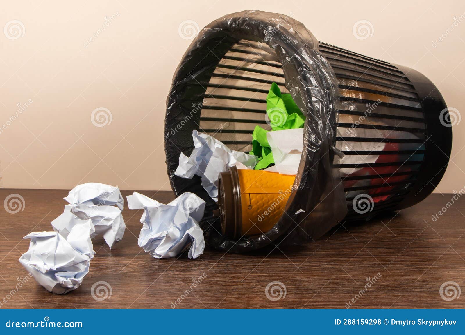 Overturned Trash Can with Crumpled Paper Balls and Disposable Cups ...