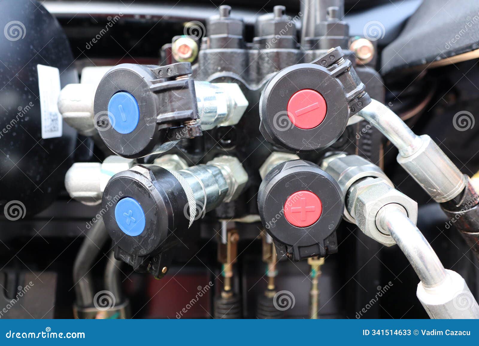 Closeup of a Hydraulic Valve System with Colorcoded Connections for ...
