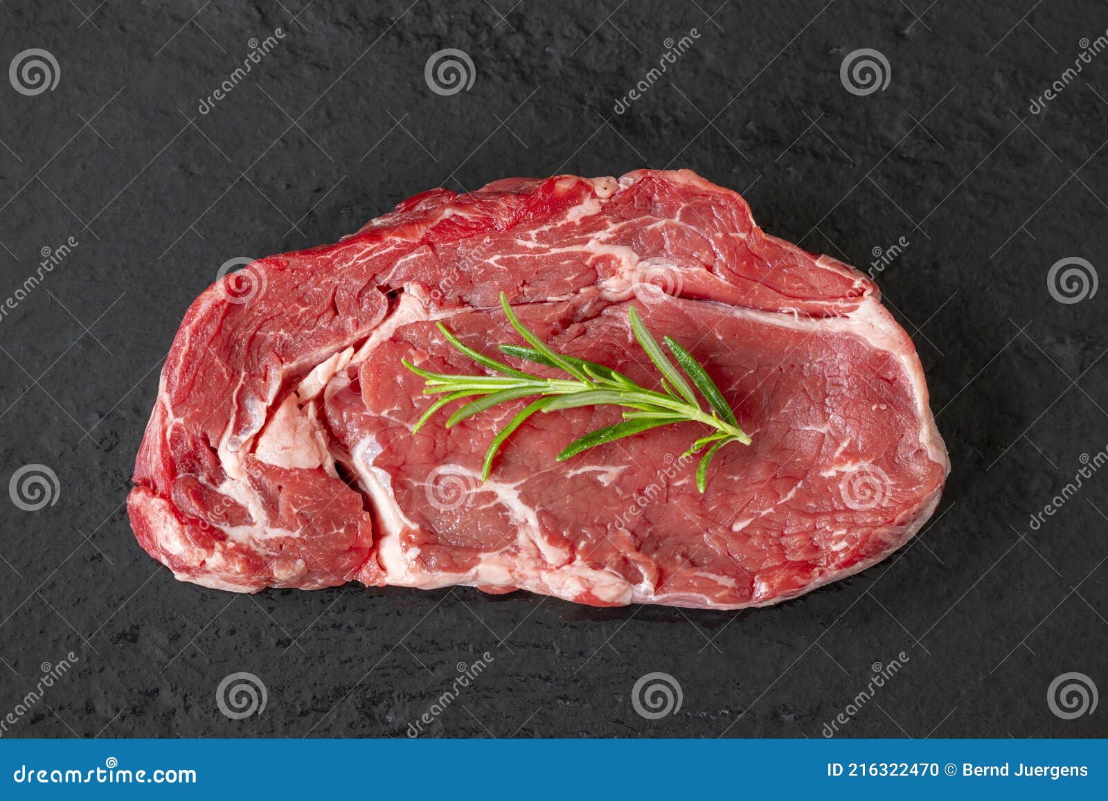 Overview of a raw steak stock photo. Image of black - 216322470