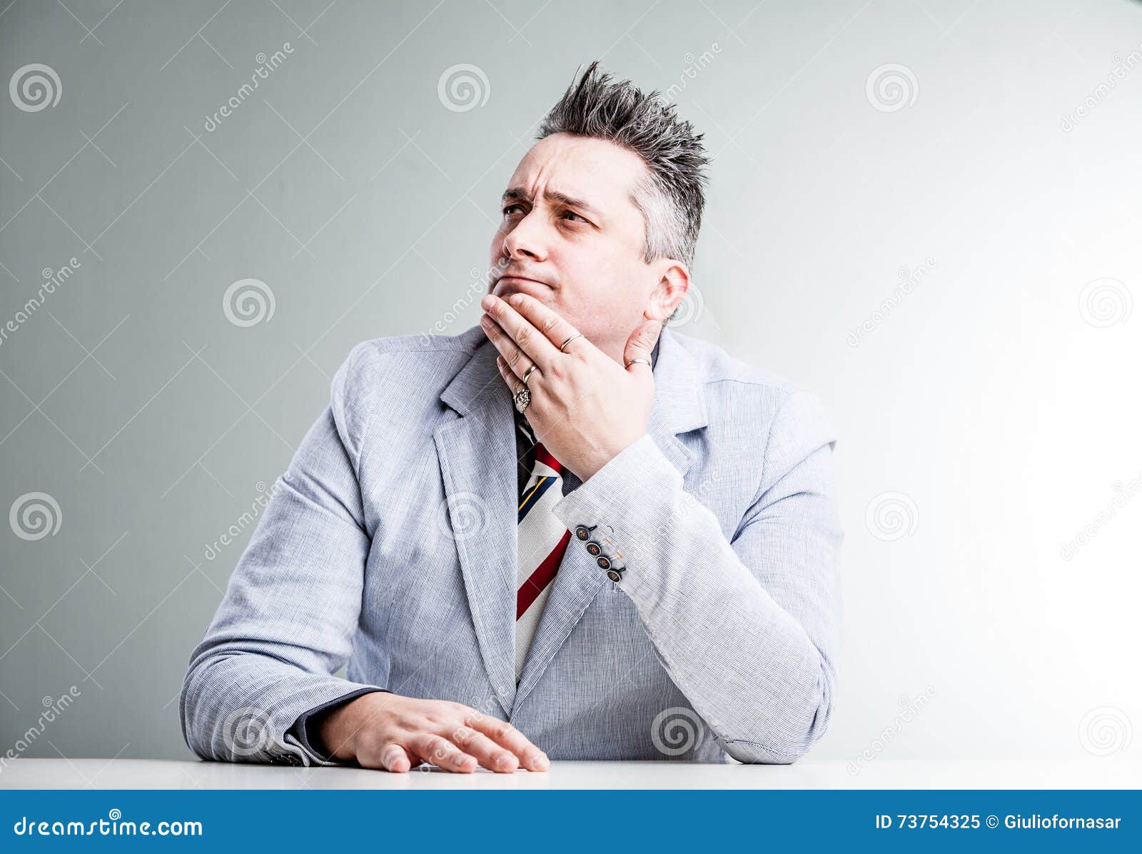 Overweight Businessman Thinking Suspicious Stock Photos - Free ...