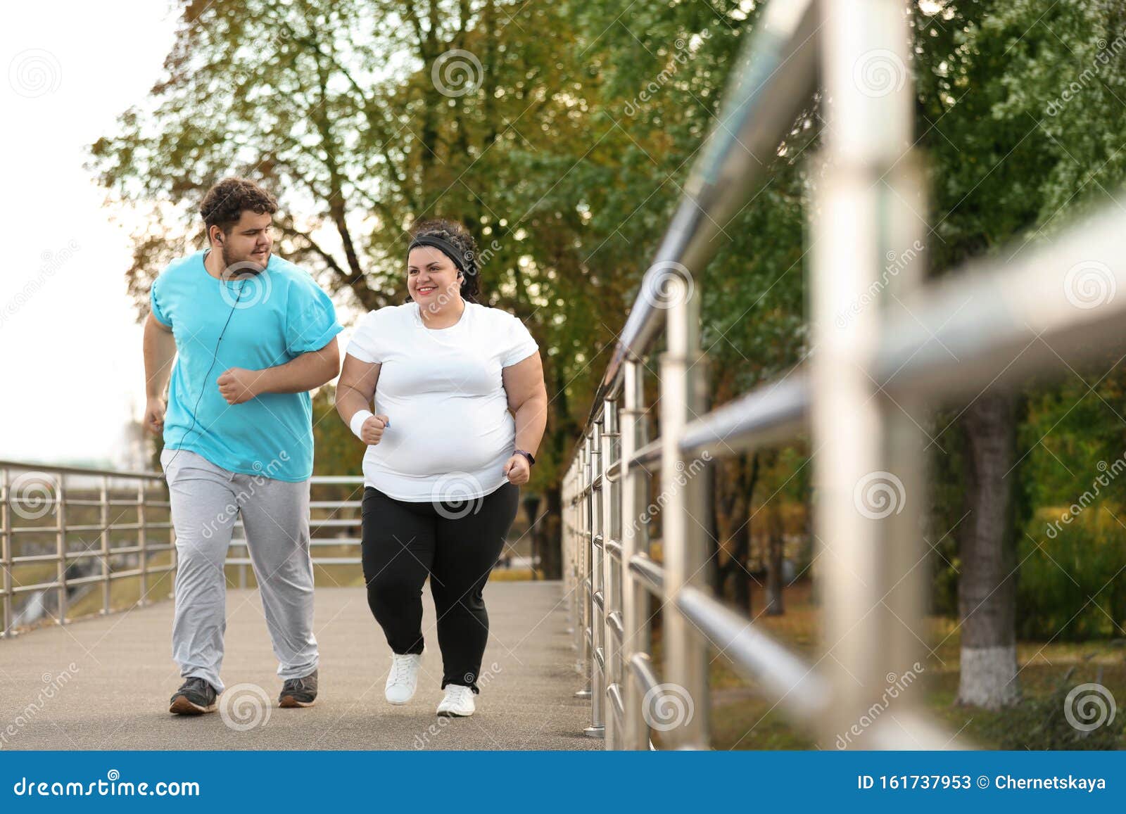 Overweight Couple Running Together Stock Image - Image of couple ...