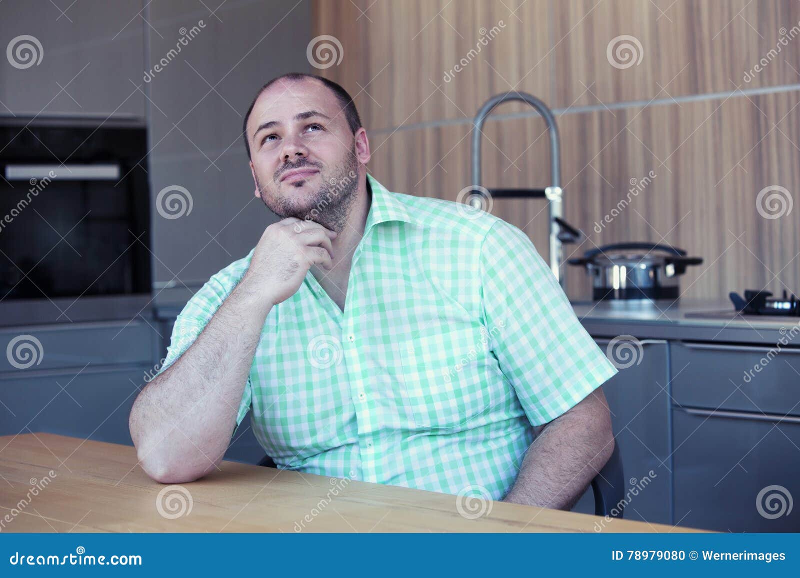 Overweight Man Sitting at Kitchen Table Stock Photo - Image of indoors ...