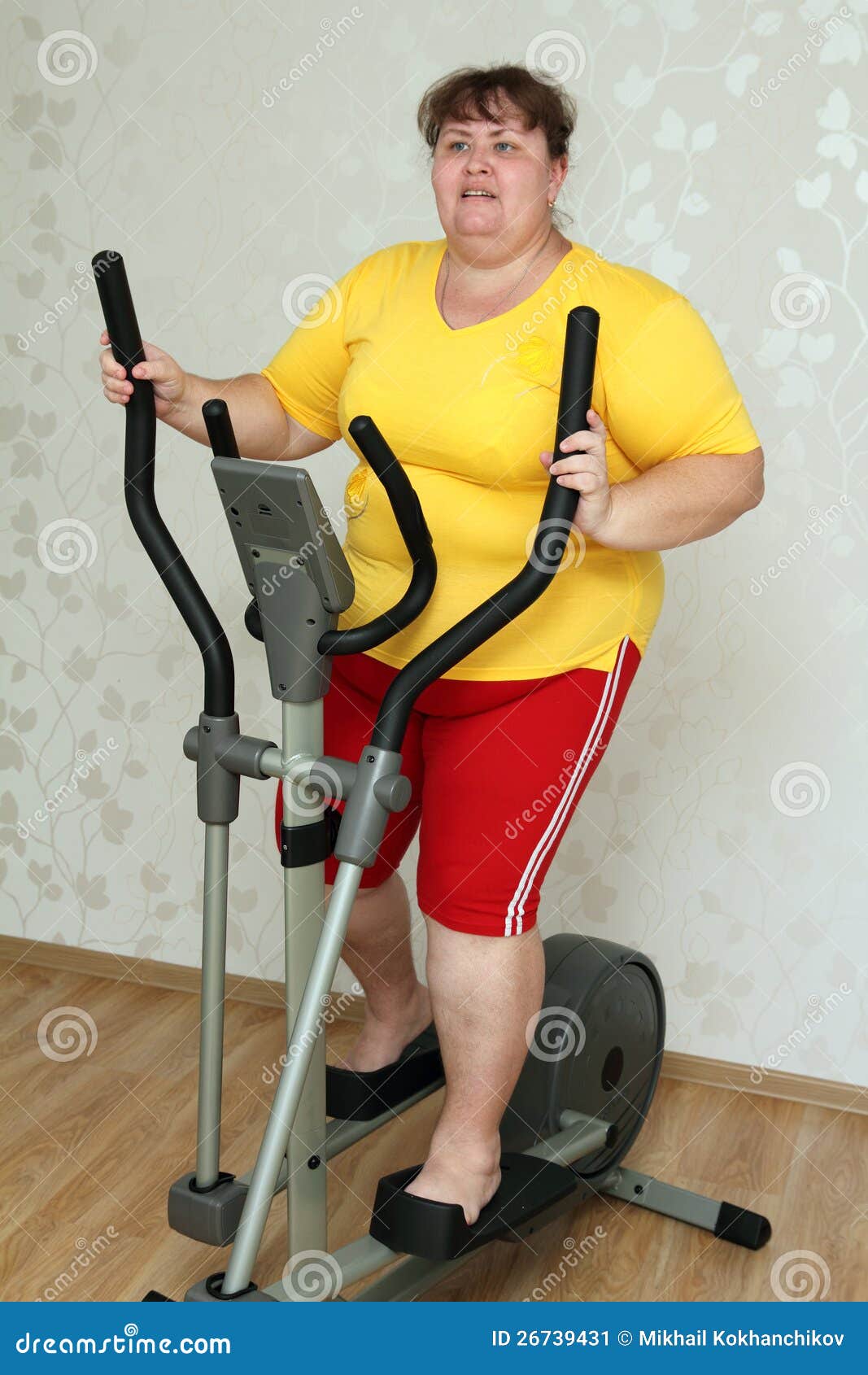Overweight Woman Exercising on Trainer Stock Image - Image of sports ...