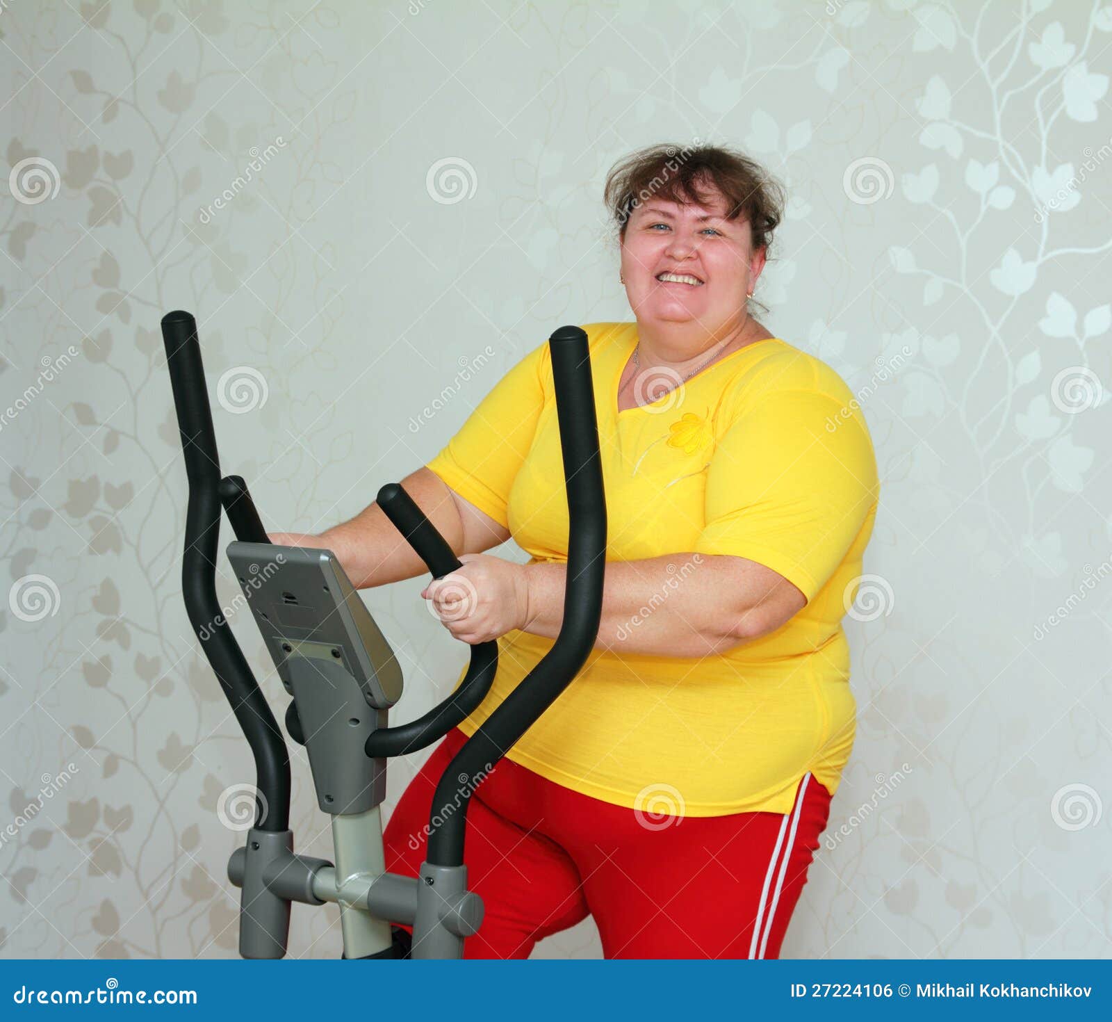 Overweight Woman Exercising on Trainer Stock Photo - Image of health ...