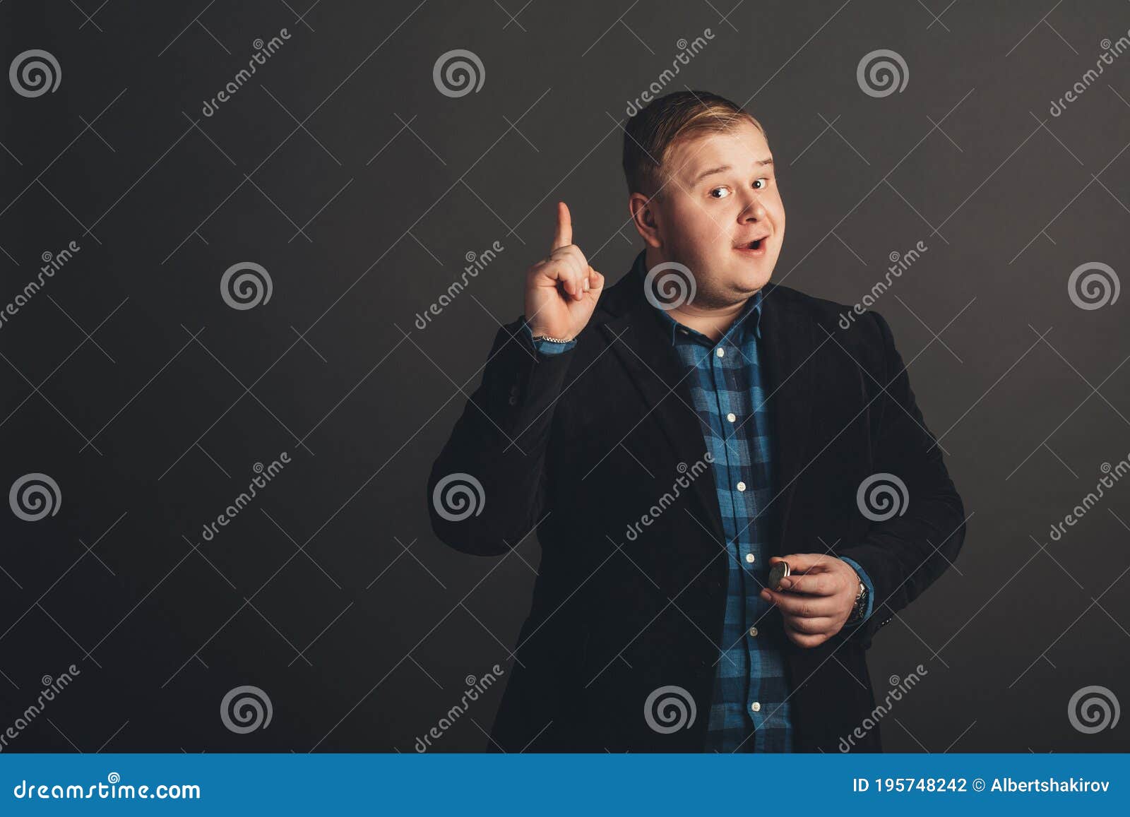 Overweight Young Man Pointing Up Stock Photo - Image of showing ...